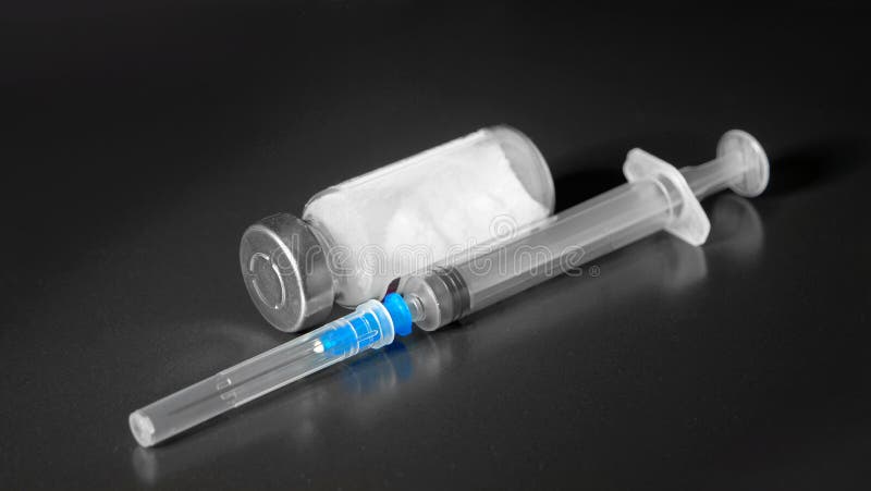 Syringe with Needle and Vial on Black Background, Ready for Injection ...