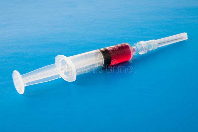 Syringe with red liquid stock image. Image of drug, medicine - 53996819