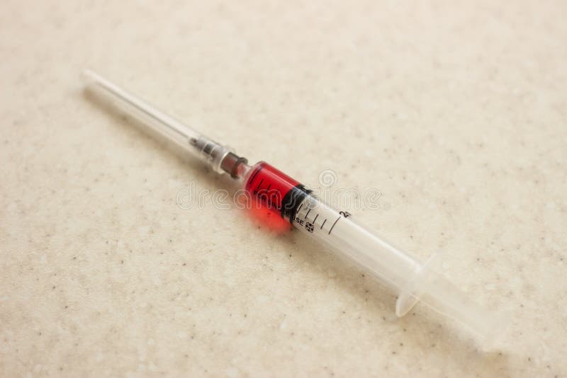 Syringe with Red Solution on White Background. Medical Syringe with Red ...