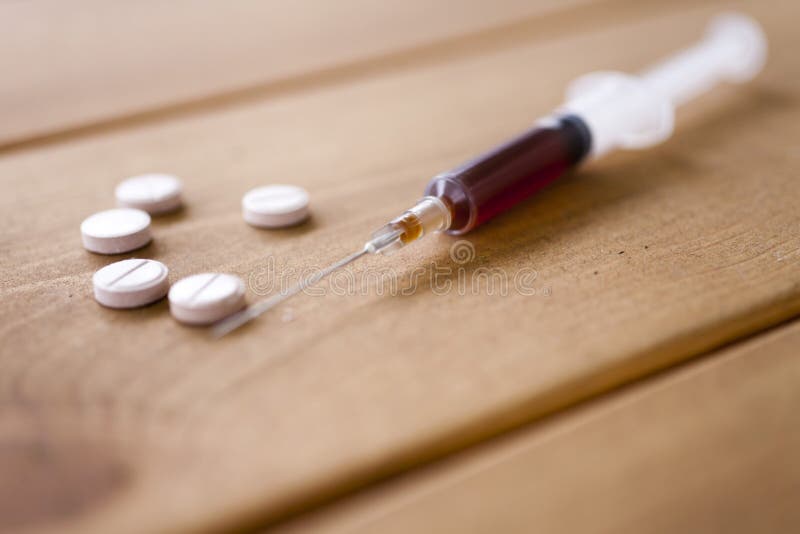 Syringe on a table stock photo. Image of care, healthcare - 62242520