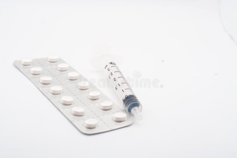 Syringe and tablets stock image. Image of syringe, painkiller - 3192335