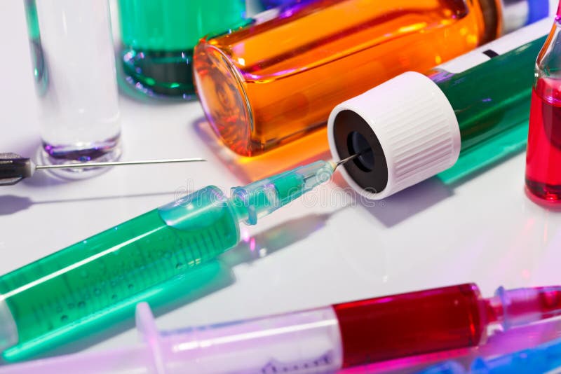 Syringe and Test Tube Macro Stock Photo - Image of multicolor, liquid ...