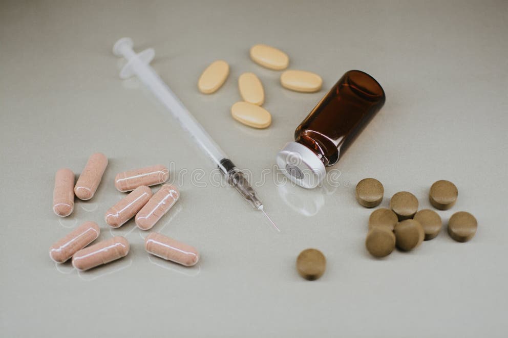 A Syringe with a Thin Sharp Needle, an Injection Ampoule and Multi ...