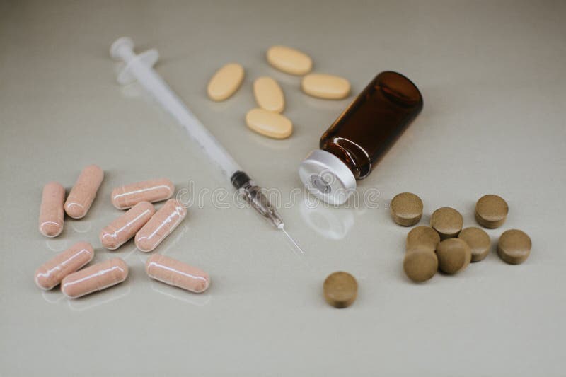 A Syringe with a Thin Sharp Needle, an Injection Ampoule and Multi ...