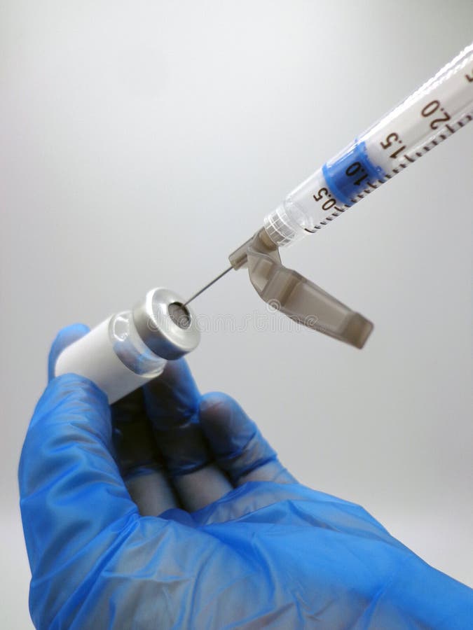 Syringe and vial stock photo. Image of female, head - 209346876