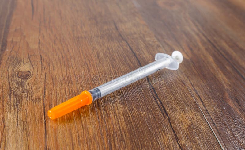 Syringe on wooden stock photo. Image of doctor, copy - 70835188