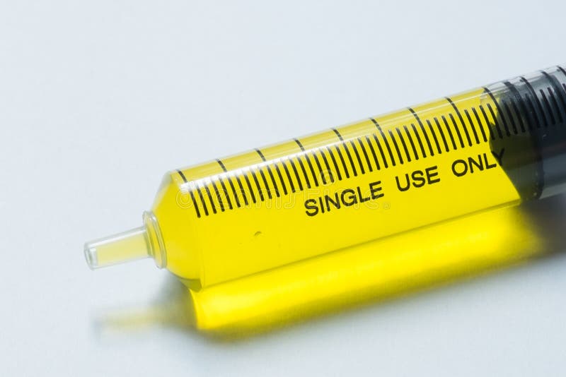 Syringe With A Yellow Medicine In Women S Hands, Stock Image - Image of ...