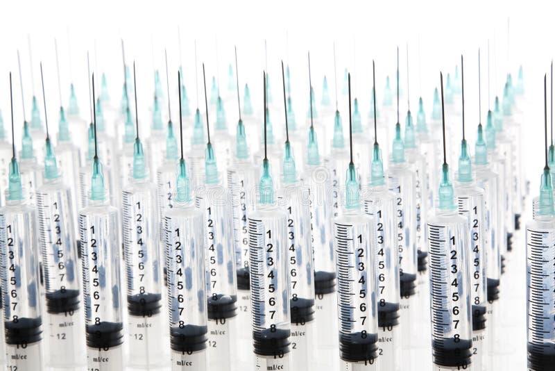 Multiple rows of syringes stock image. Image of experiment - 17032059