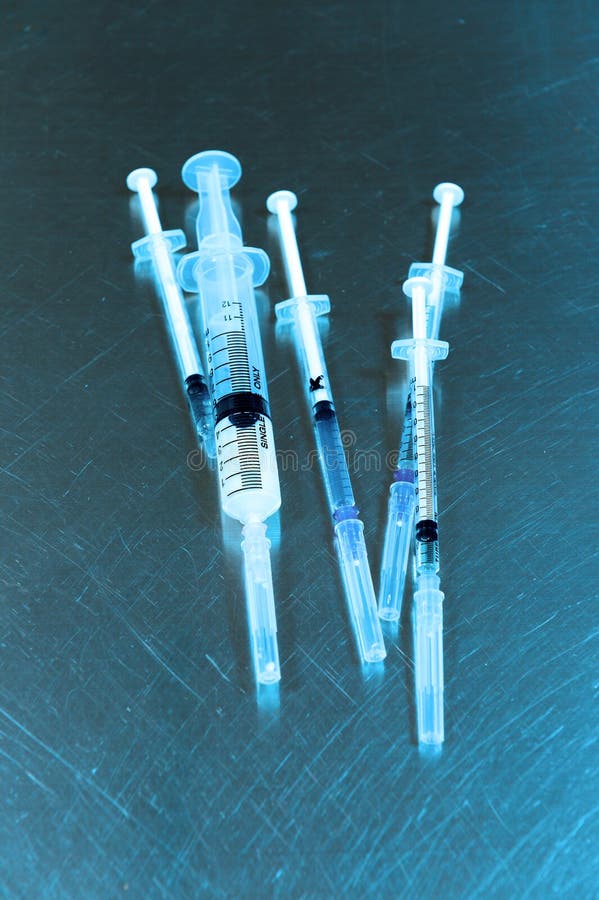 Syringes of different size stock image. Image of protection - 50592085