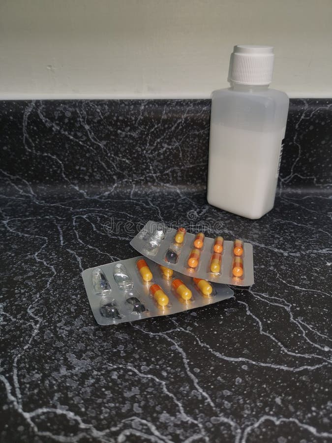 Syrup and Capsule Medicine stock image. Image of circle - 209899051