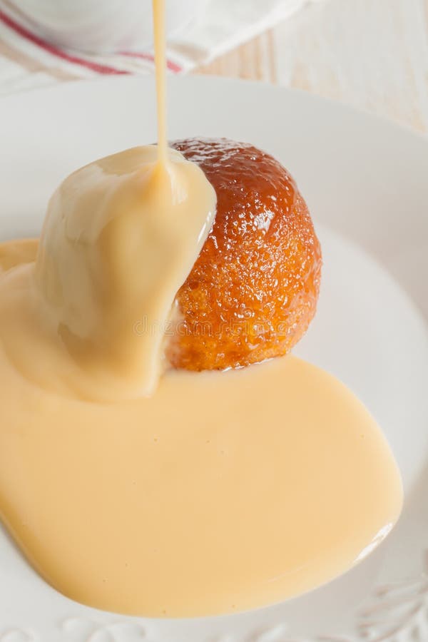 Treacle or Syrup Sponge and Custard Stock Image - Image of custard ...