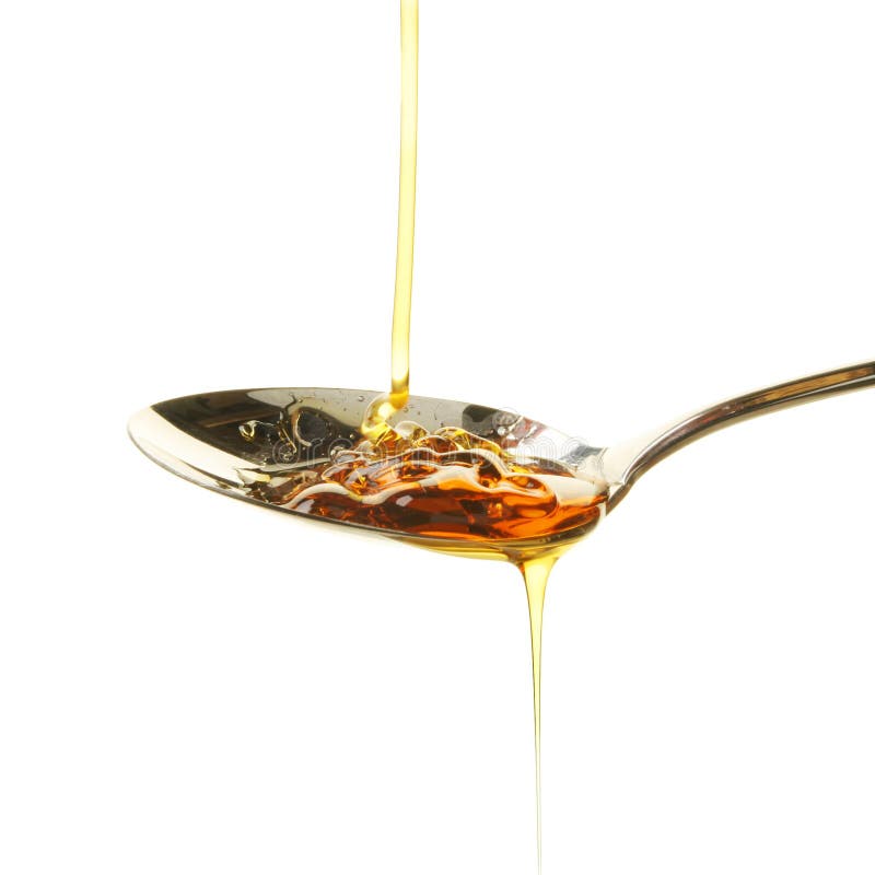 Syrup in spoon stock image. Image of spoon, pouring, golden - 11317737