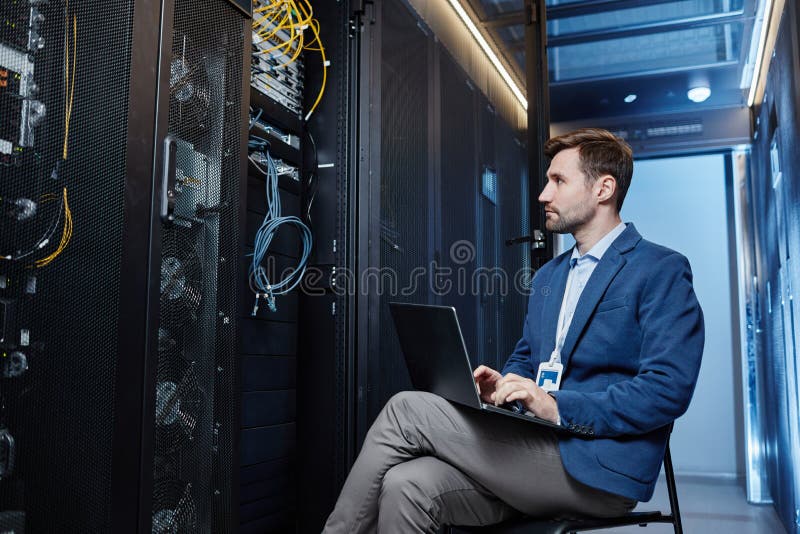 System Admin Working with Server Stock Photo - Image of technician ...