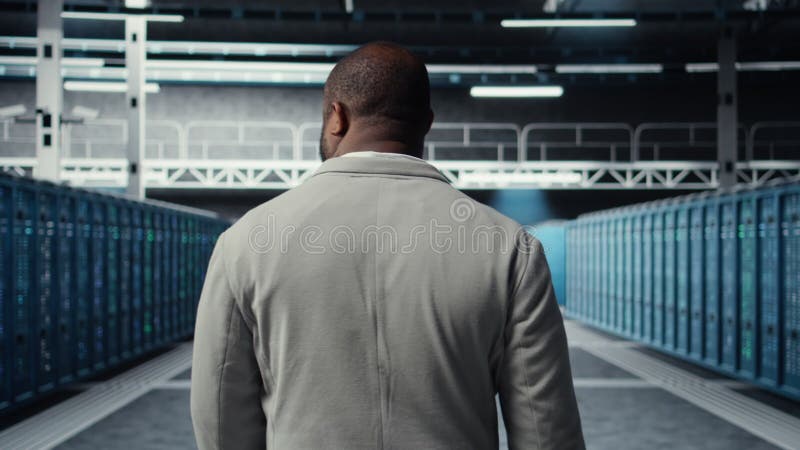 System Administrator in Data Center Doing Inspection on Infrastructure ...