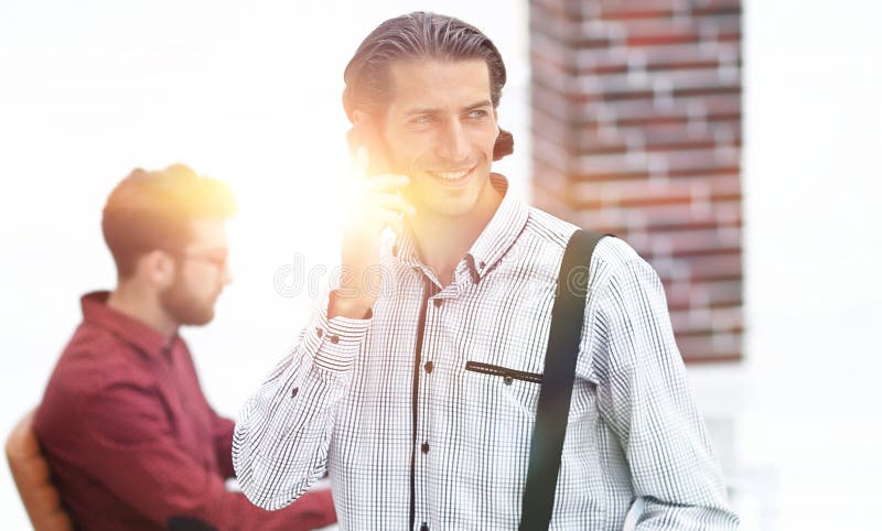 Administrator Talking on the Phone and Looking at Documents Stock Image ...