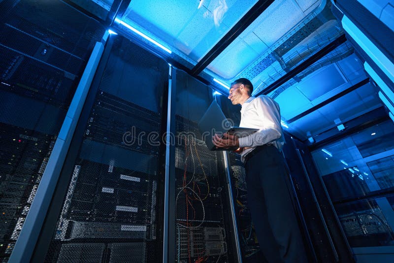 System Administrator Watching Equipment Inside Erver Cabinet Stock ...