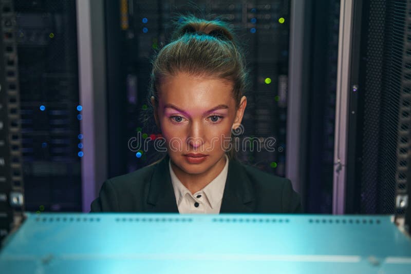 System Administrator Working in Network Server Room Stock Image - Image ...