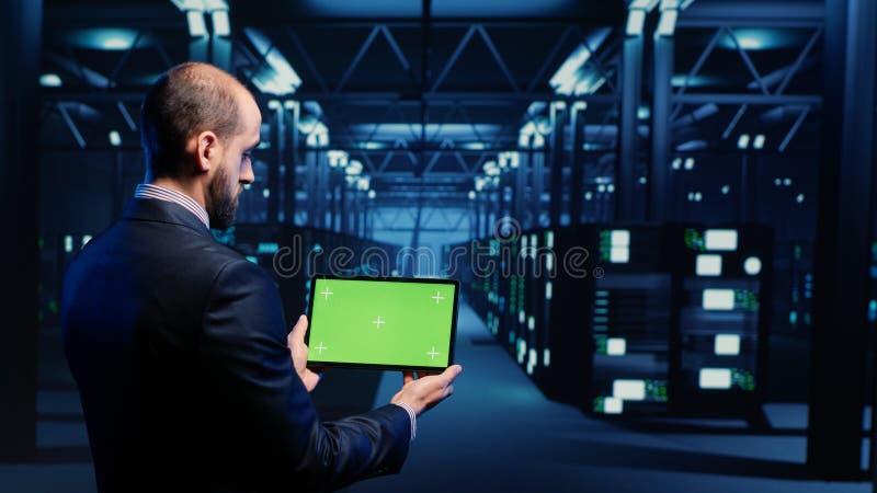 System Engineer Checking Green Screen Display on Tablet Stock Photo ...