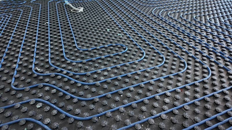 System of Underfloor Heating. Installation of a Heat Flooring System ...