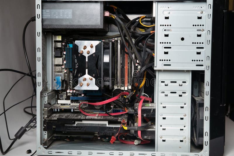 The System Unit of the Computer is Disassembled without a Cover.Lots of ...