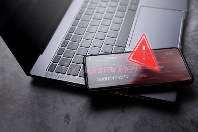 Smartphone Laying on Laptop with Red Warning Notification. Stock Image ...