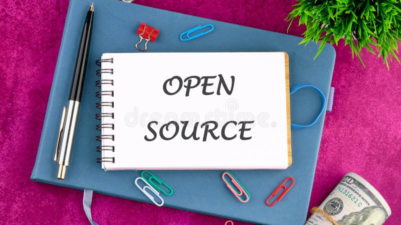 System and Website Builder Concept. OPEN SOURCE in a Mini Notebook on a ...