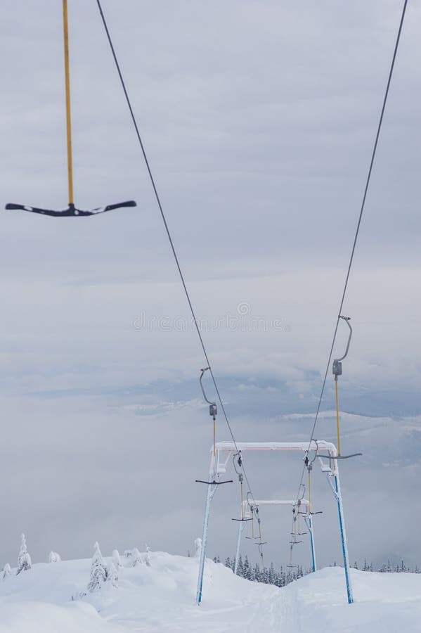 T-bar Lift, a Style of Surface Lift Stock Photo - Image of foggy, tbar ...