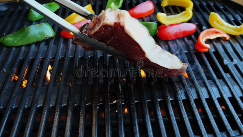 T-bone Steak on Barbecue Grill at Restaurant Stock Footage - Video of ...