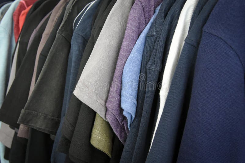 T-shirts on the rack stock photo. Image of hanger, hook - 93429254