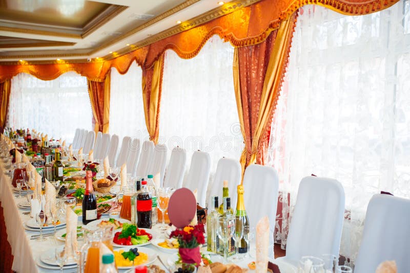 Table Appointment for Guests with Appetizers on a Banquet Table Stock ...