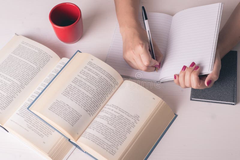 Table with Books and Coffe and Female Hands Stock Image - Image of ...