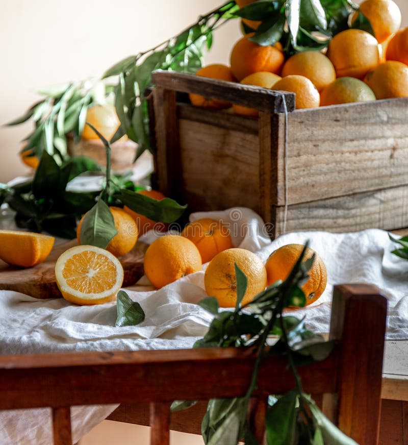 Table with Box of Fresh Orange with Orange Tree Branch and Fresh Orange ...