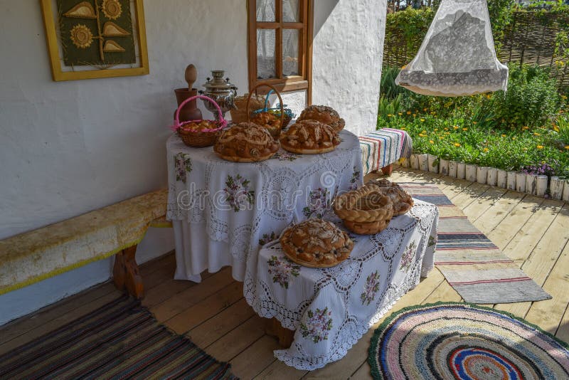 Assortment of Bread and Tablecloth on a Wooden Table Stock Photo ...