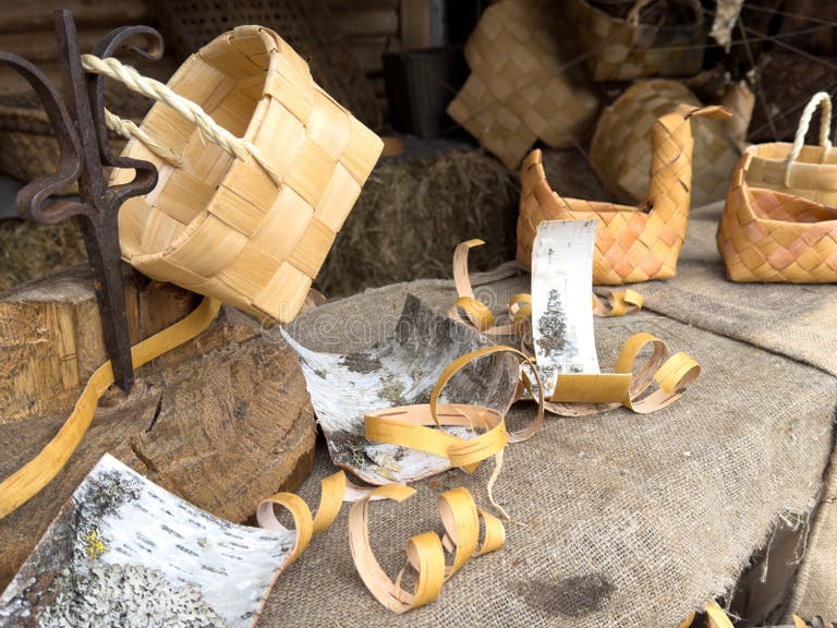 A Table with a Bunch of Baskets and a Broken Basket Stock Photo - Image ...