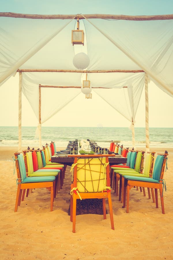 Table and Chair Set on the Beach for Dinner Stock Image - Image of ...