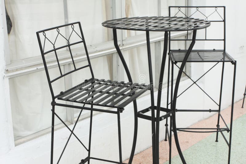 Table and chairs stock image. Image of iron, chairs, metal - 4678123