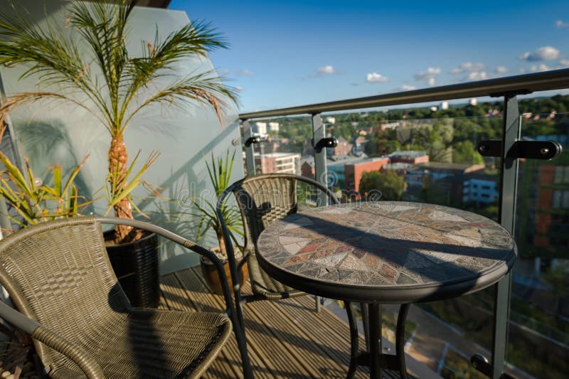 Table and Chairs on Balcony Stock Image - Image of architectural ...