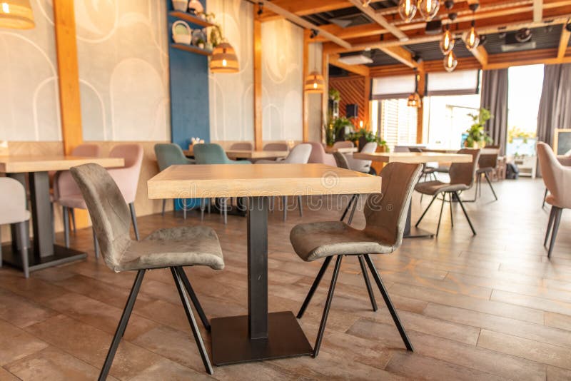 Table with Chairs in a Cafe. Stock Image - Image of glass, architecture ...