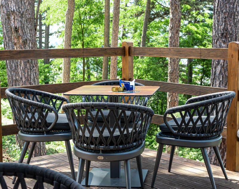 Table with Chairs in Cafe Kota 777 Surrounded by a Forest Editorial ...