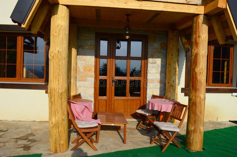 Table and Chairs in Front of the House Editorial Photography - Image of ...