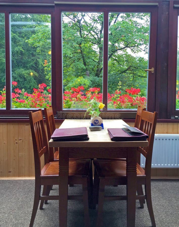 Table and Chairs in Germany Restaurant Editorial Photography - Image of ...