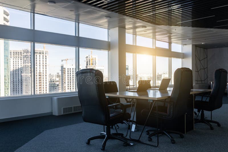 Table and Chairs in the Interior of a Modern Office with Large ...