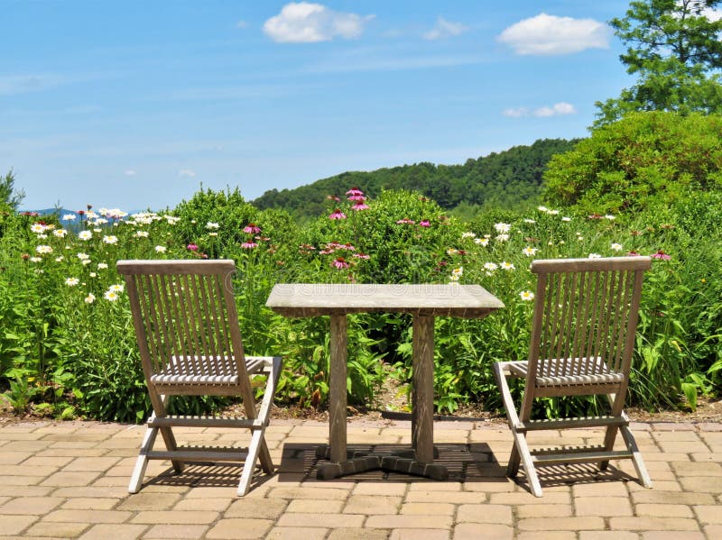 Table and Chairs Overlooking the Mountains Stock Image - Image of ...