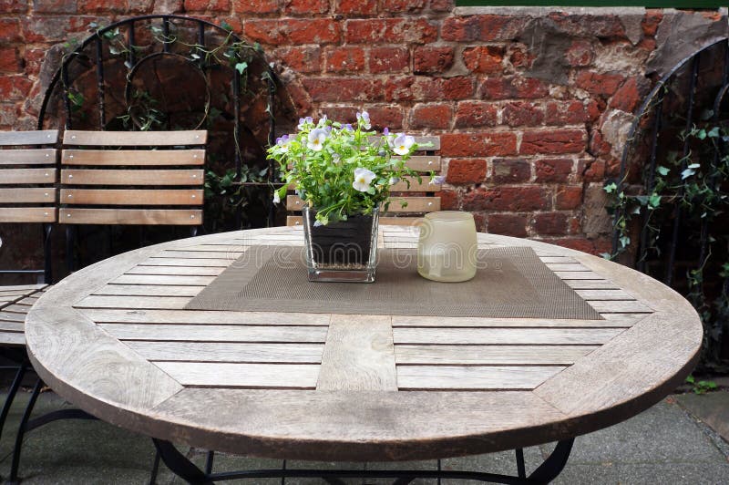 Cafe Circle Tables and Wicker Chairs on Street Pavement. Stock Photo ...