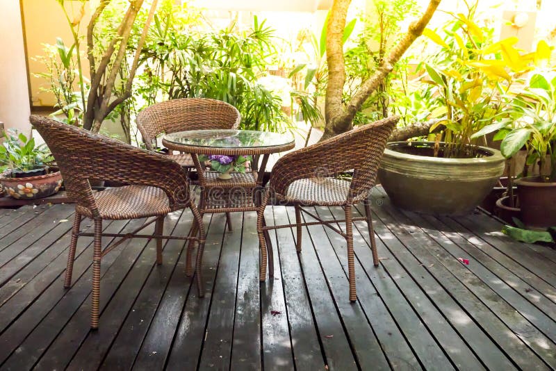 Table and chairs standing stock photo. Image of lush - 72346430