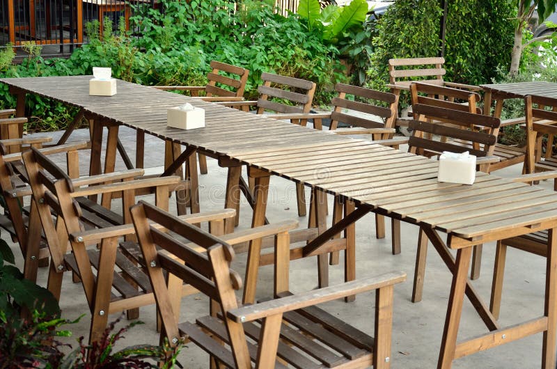 Table and Chairs Standing on a Lawn Stock Photo - Image of front ...