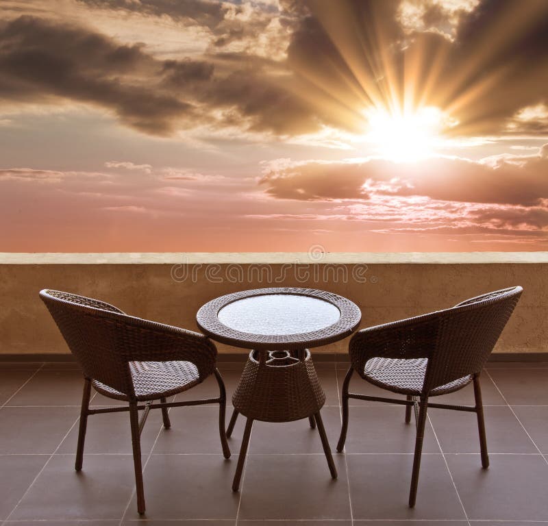 Table and Chairs on a Terrace, View on Sunset Stock Photo - Image of ...
