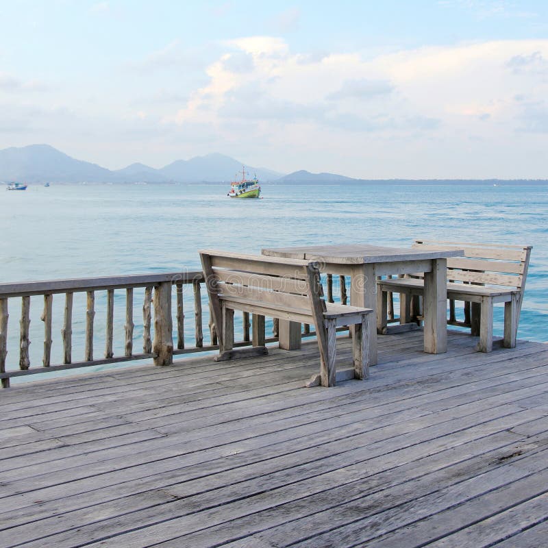 Table and Chairs on a Tropical Beach Resort Stock Photo - Image of ...