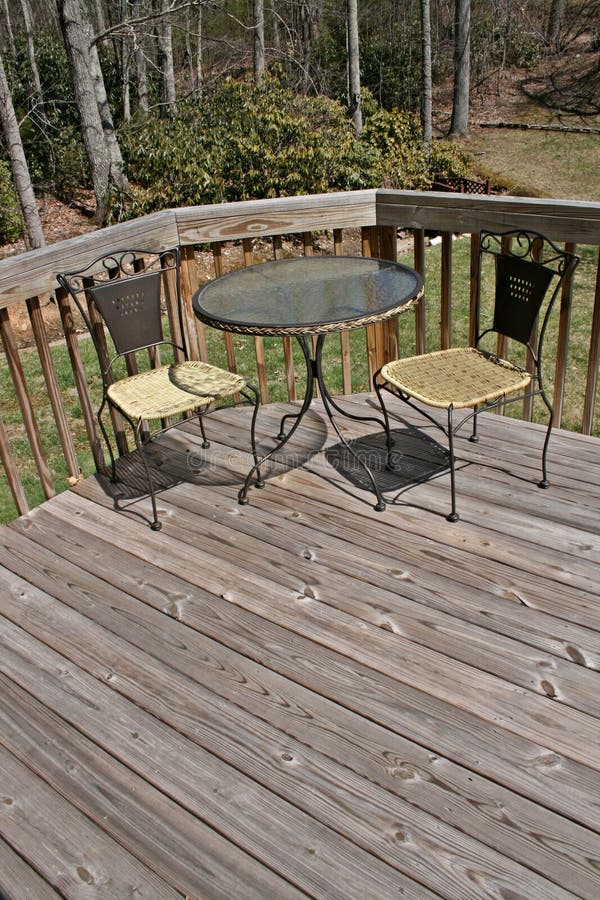 Table and Chairs on Wood Deck Stock Image - Image of wooden, table: 4695897