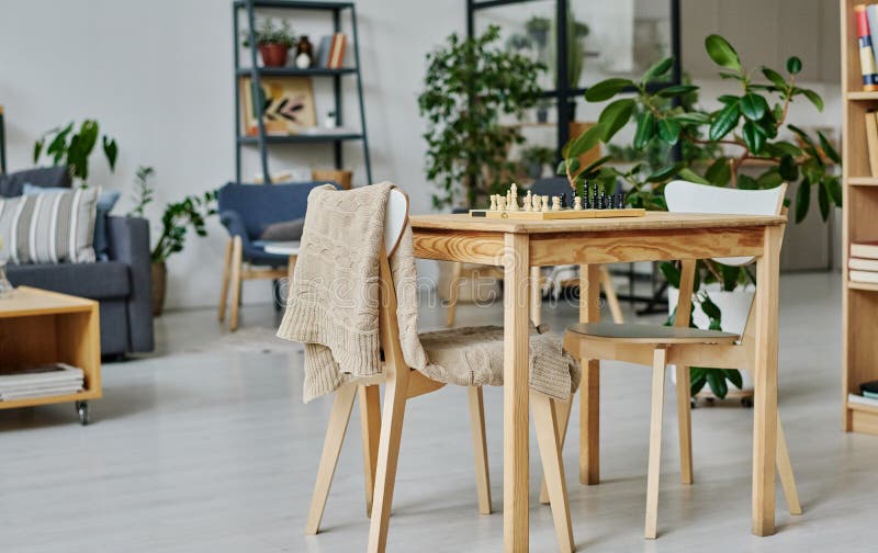 Table with Chess Board in the Room Stock Image - Image of wooden, chair ...